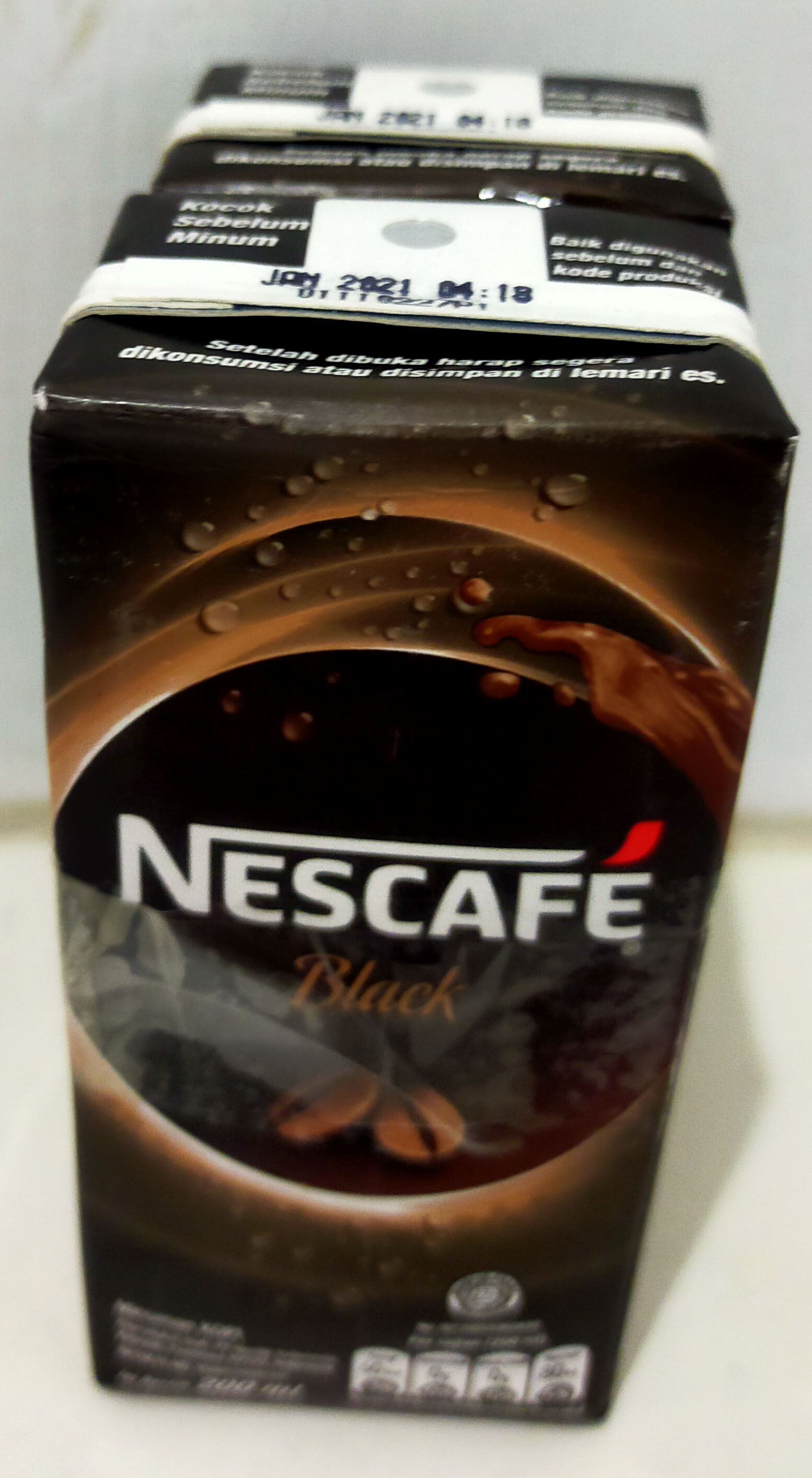 NESCAFE BLACK UHT 200ML (M2)
